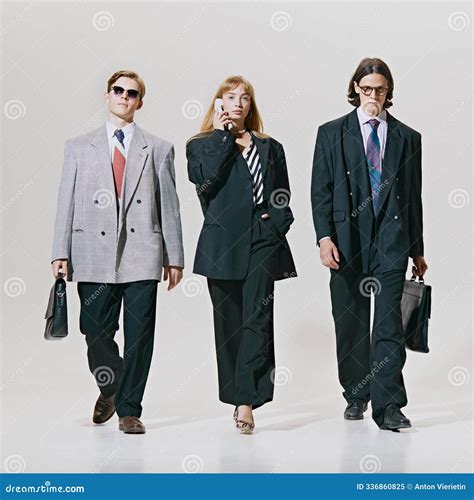 Woman And Two Men Her Colleagues Walking With Confidence Dressed