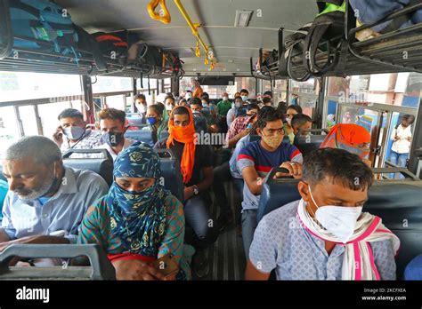 Passengers Sit In The Bus As They Move Towards Their Native Place