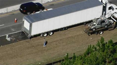 Images Woman Killed When Suv Slams Into Tractor Trailer