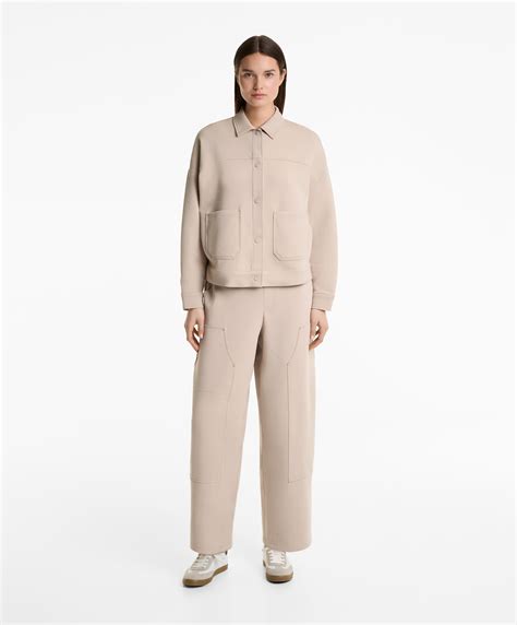 ชุดวอร์มทรงตรงผ้าผสมฝ้ายสีน้ำตาลหนังอูฐ Oysho Thailand