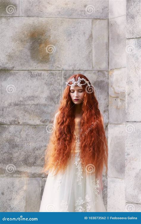 Beautiful Red Haired Girl With Long Curly Hair In The Bride In A Long Lace Dressa Natural