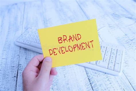 Conceptual Hand Writing Showing Brand Development Business Photo Showcasing Defining The