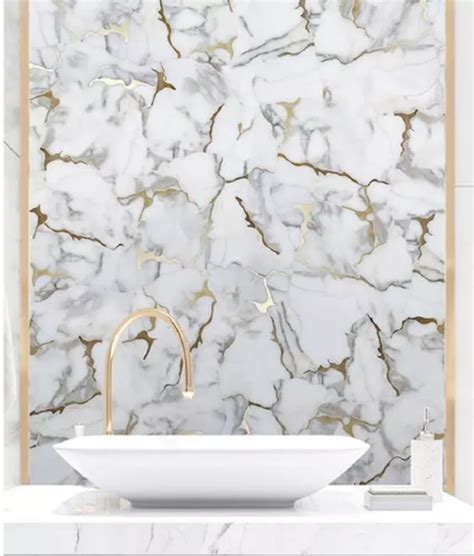 Calacattagoldbrassgeodewaterjetmosaicinstallgrandepngv1684523134