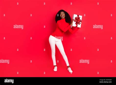 Full Length Photo Of Young Black Woman Happy Positive Smile Hold T