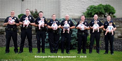 Foto Që Ndreq Ditën Tetë Oficerë Policie Bashkë Me Foshnjet E Porsalindura