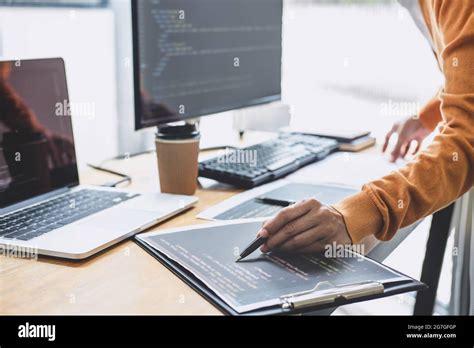 Young Professional Programmer Working At Developing Programming And Website Working In A