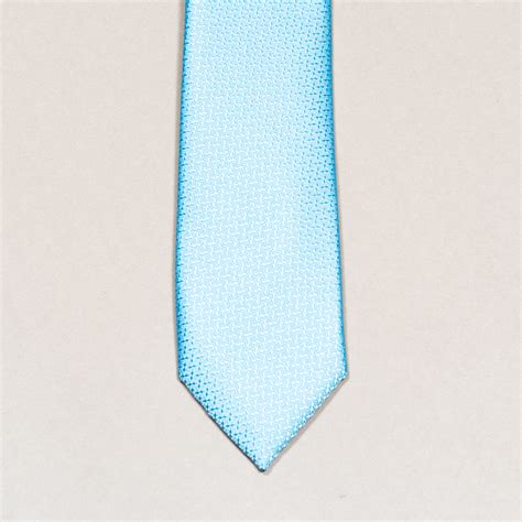 Corbata celeste estructura labrada marca Emporium clásico Emporium Guatemala