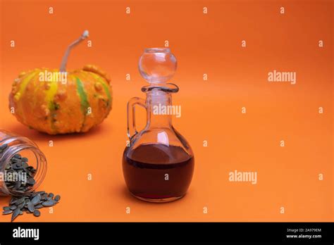 Healthy organic pumpkin oil with pumpkin seeds and pumpkin Stock Photo ...