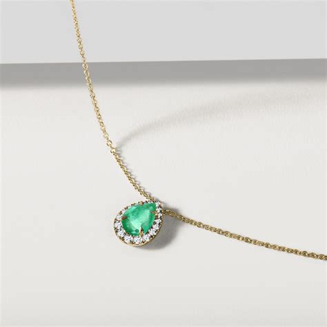 Elegant Diamond Necklace With Emerald In Yellow Gold Klenota