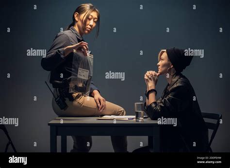 An Experienced Investigator During An Interrogation At A Police Station