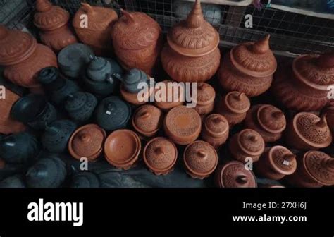 Collection Of Various Clay Jars In Different Shapes And Colours