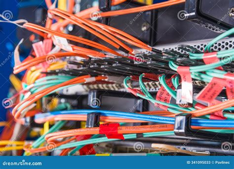 Hand Of Engineer Plugging In Ethernet Cable Into Server Switch P Stock