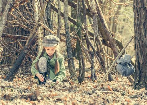 Little Cute Girl Making A Bonfire In The Forest Stock Image Image Of
