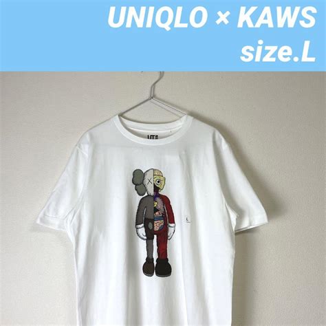 ユニクロ Uniqloカウズ Kawstシャツ人体模型タグ付きl メルカリ