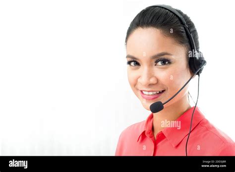 Woman Wearing Microphone Headset As An Operator Or Call Center Staff