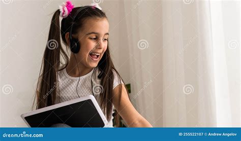 A Young Girl Is Attending Online School Or Classes Study In Lock Down