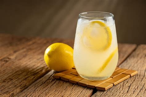 Premium Photo Glass Of Refreshing Lemon Homemade Drink