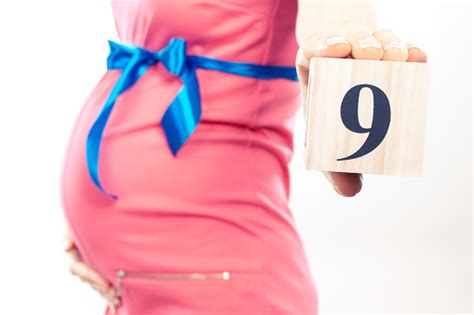 Vintage Photo Hand Of Woman Showing Number Of Ninth Month Of Pregnancy