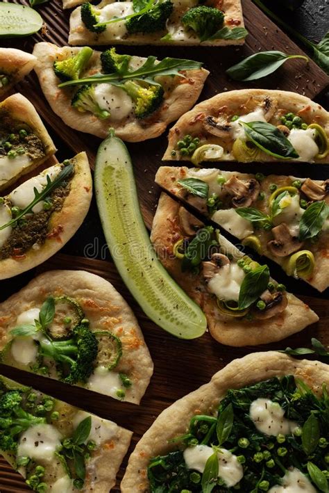 Green Healthy Pizzas Cuts Flat Lay With Cucumbers Paprika Mozzarella