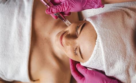 Premium Photo Woman Getting A Facial Dermapen Treatment At Spa Salon