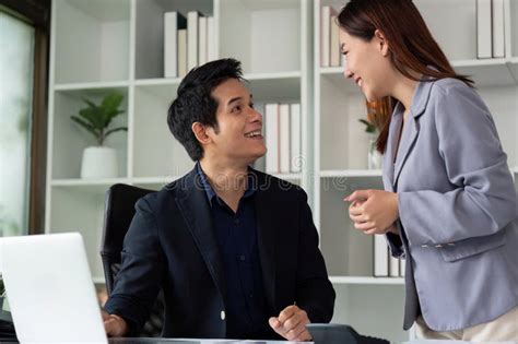 Collaboration And Teamwork Colleagues Engaging In A Productive