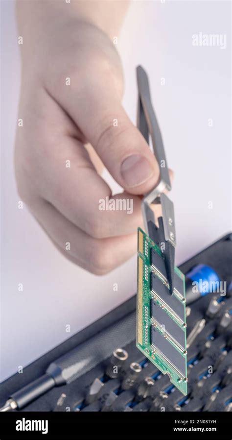 Technician Fixing Computer Repair And Upgrade Concept Of Laptop Workshop Background Stock