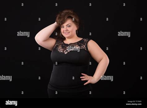 Beautiful Buxom Girl In A Black Evening Dress Portrait Of A Chubby