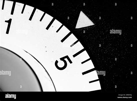 Monochrome Close Up Of An Analog Laboratory Timer Set To Four Stock