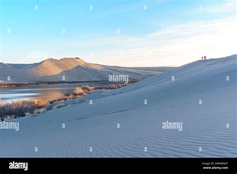 Sand Dunes Sunset People Standing On Sand Dune Sand Dune Formations