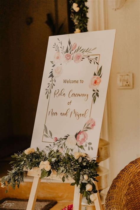 An Elegant And Intimate Roka Ceremony With The Couple In Pastel Outfits Wedding Entrance Decor