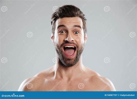 Excited Bearded Man With Naked Shoulders And Open Mouth Stock Image