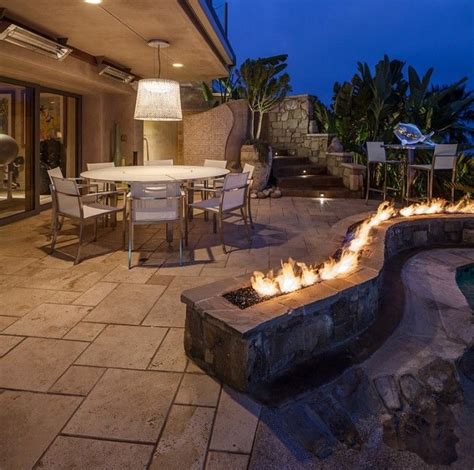 17 Extravagant Backyard Fireplaces And Fire Pits That Will Leave You