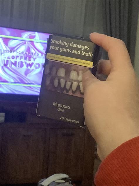 Smoking Marlboro Gold Rcigarettes