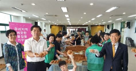장흥군 새마을회 Em 흙공으로 깨끗한 물길 보전