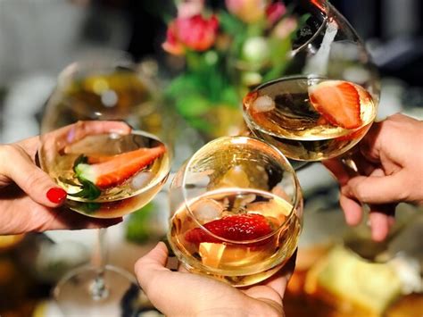 Premium Photo Midsection Of People Holding Wine Glasses