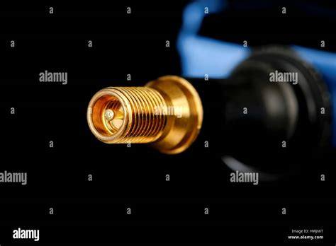 Closeup Of A Tire Valve And A Fragment Of TPMS Sensor Housing Stock Photo Alamy