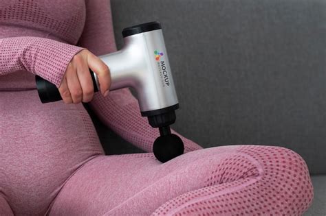 Premium Psd Person Using Massage Gun Mockup