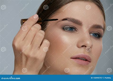 Eyebrow Coloring Woman Applying Brow Tint With Makeup Brush Stock