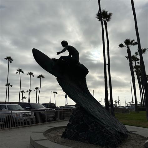 Naked Surfer Statue In Huntington Beach Ca Photos