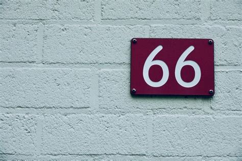 Premium Photo Close Up Of Number 66 On Wall