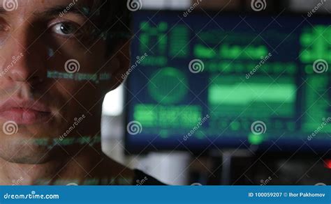 Portrait Of Man Programmer Hacker With Green Code Characters Reflect On