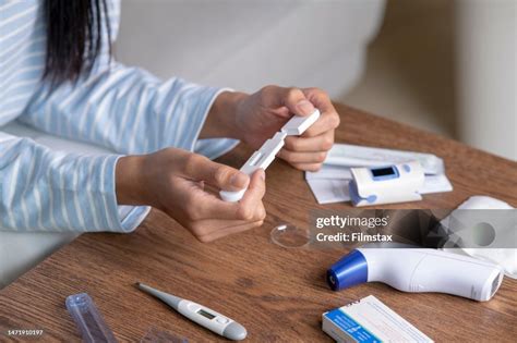 Young Asian Women Use Selftesting Kits And Many Other Medical Devices