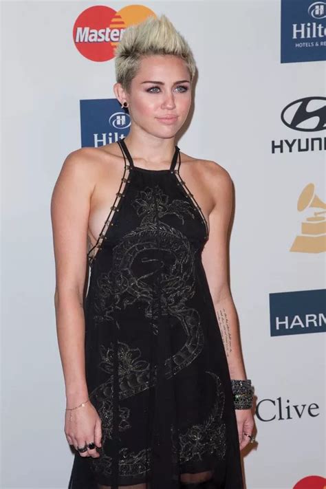 Miley Cyrus Suffers Nip Slip Wardrobe Malfunction At Pre Grammys Party Mirror Online