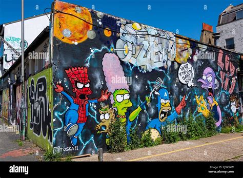 Simpsons Graffiti Wall By Toska11 In A Backstreet In Brighton Stock