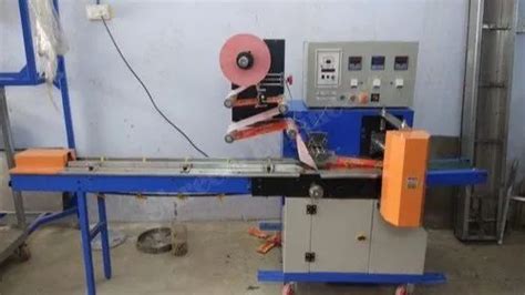 Flow Wrap Machine Chikki Packing Machine Manufacturer From Faridabad