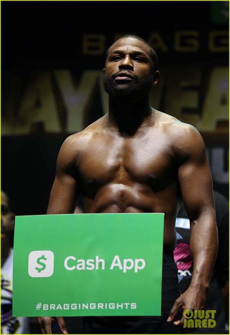 Floyd Mayweather And Logan Paul Flex Their Muscles At Weigh In Ahead Of