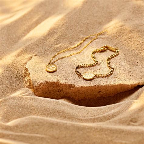 Unity Gold Tone Aum Bracelet In Stock Arkai