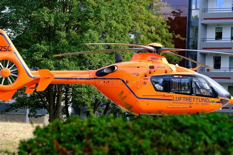 Modern Orange Helicopter Eurocopter Arrived To Provide Urgent Medical