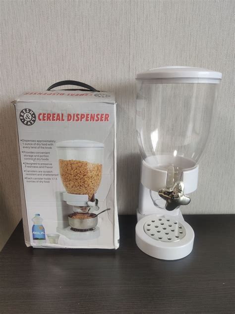 Диспенсер для сипучих з дозатором 350 грн Посуд кухонне приладдя