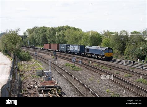 Class 66 Diesel Locomotive No 66305 Pulling A Freightliner Train At